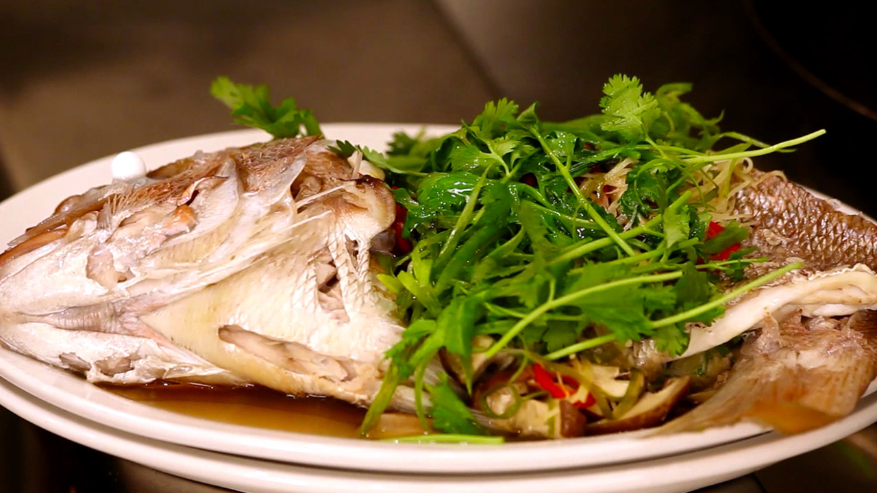 Whole Steamed Fish with Rice Wine & Scallions - Cooking Videos | Grokker